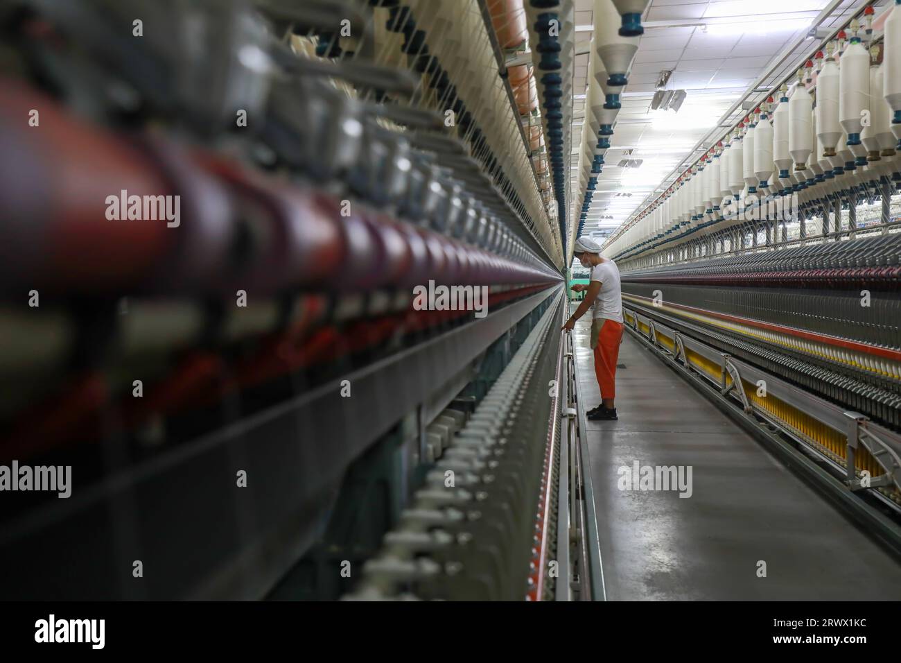 luannan county, China - June 22, 2023: The spinning worker is working ...