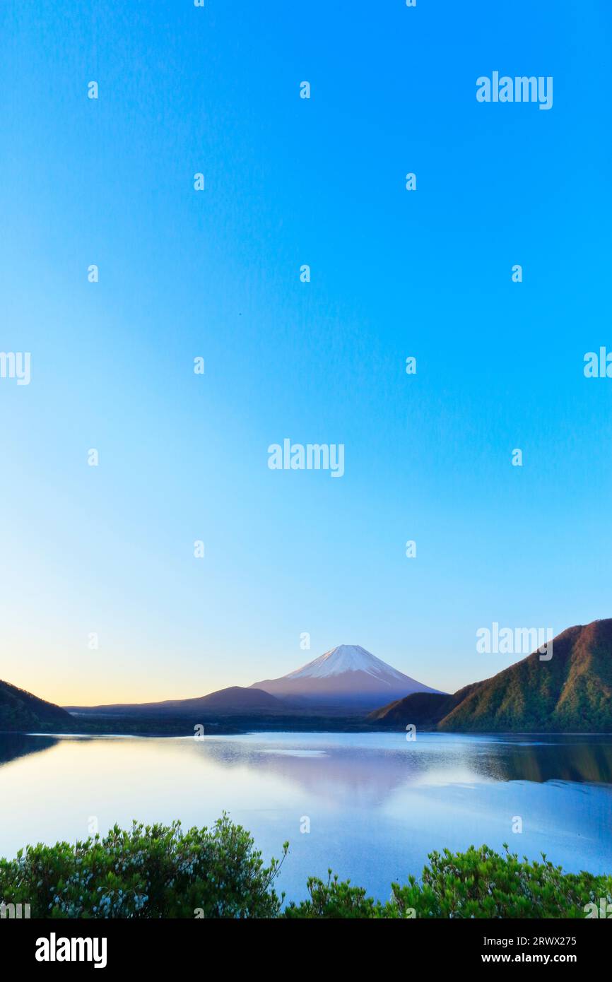 Mt. Fuji in the morning glow and Mt. Fuji upside down on Motosu Lake ...