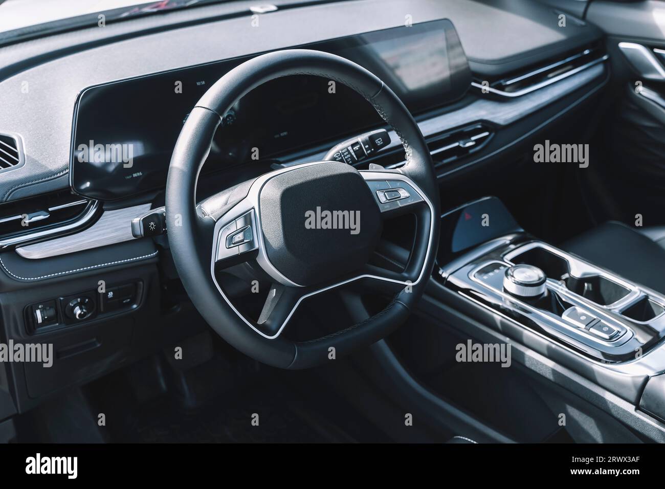 Car interior with auto dashboard panel. New automobile carbon cabin ...