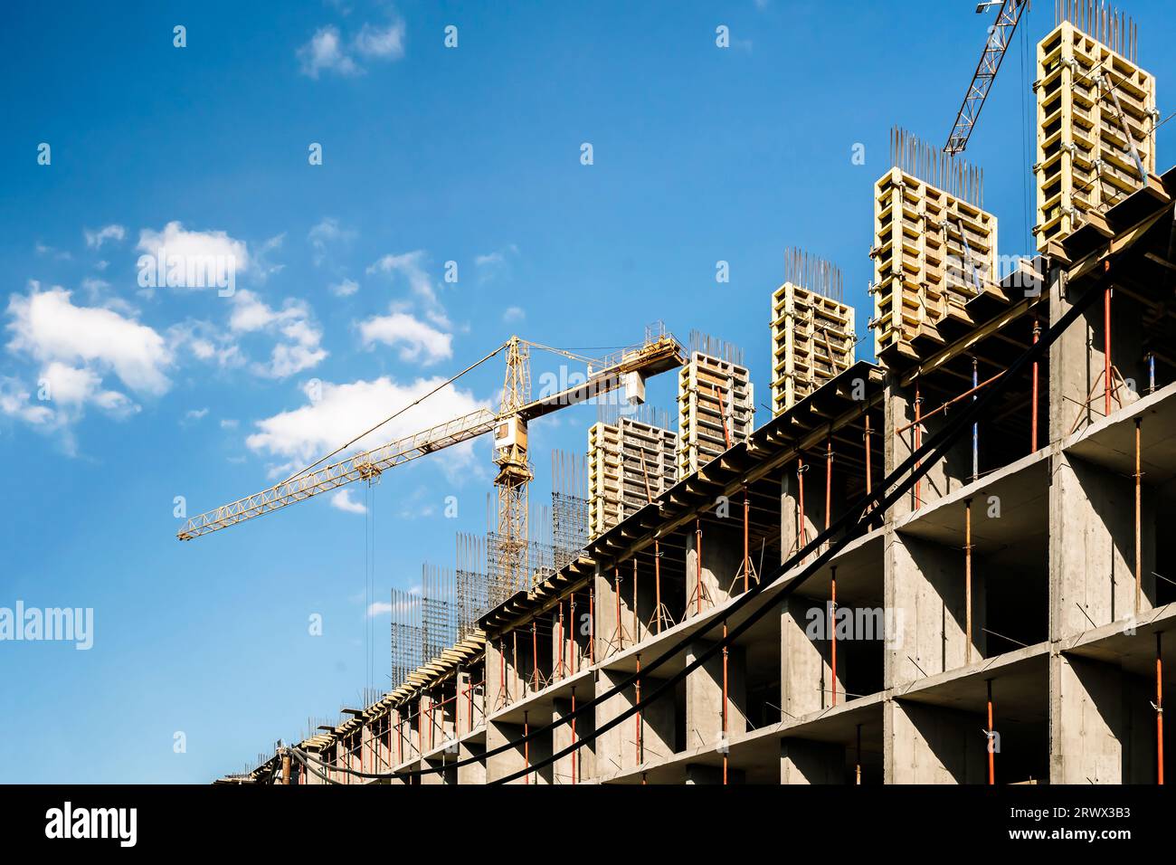 Construction monolithic building. Construction site with cranes ...