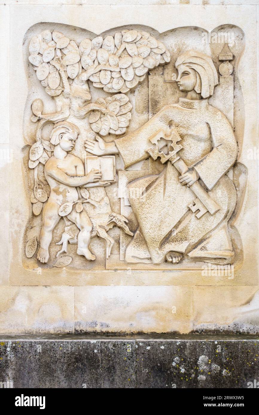 A modernist bas-relief carving depicting Grammar on the facade of the ...