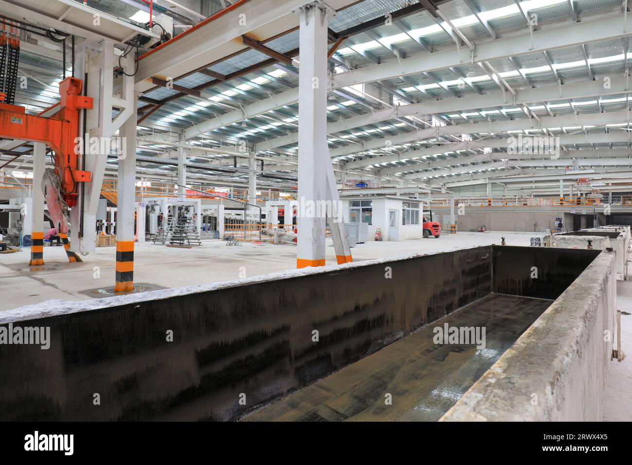The raw material transport vehicle is on the track in a factory Stock ...