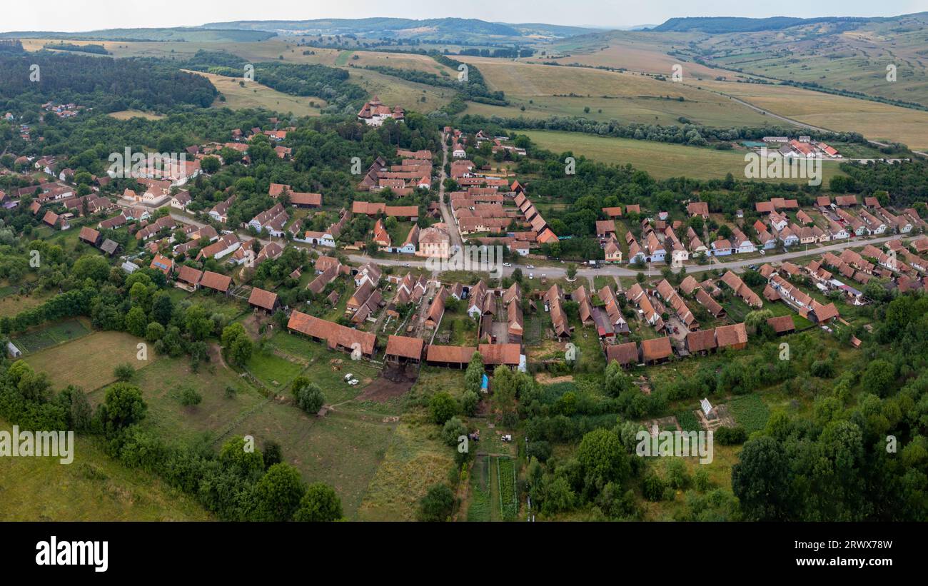 The fortified church and village of Viscri in Romania Stock Photo - Alamy