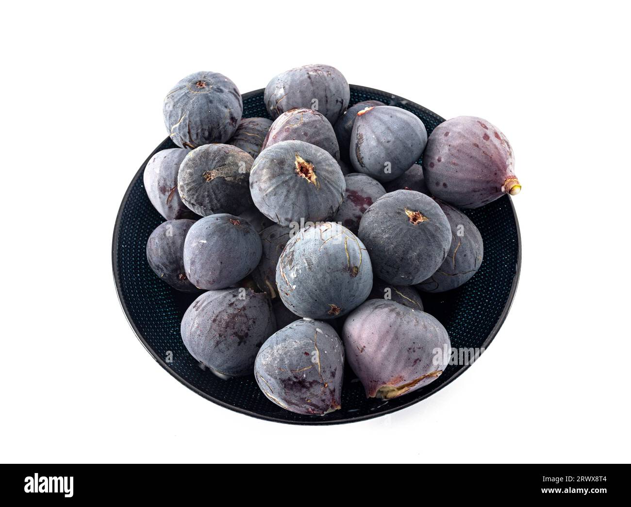 purple figs in front of white background Stock Photo - Alamy