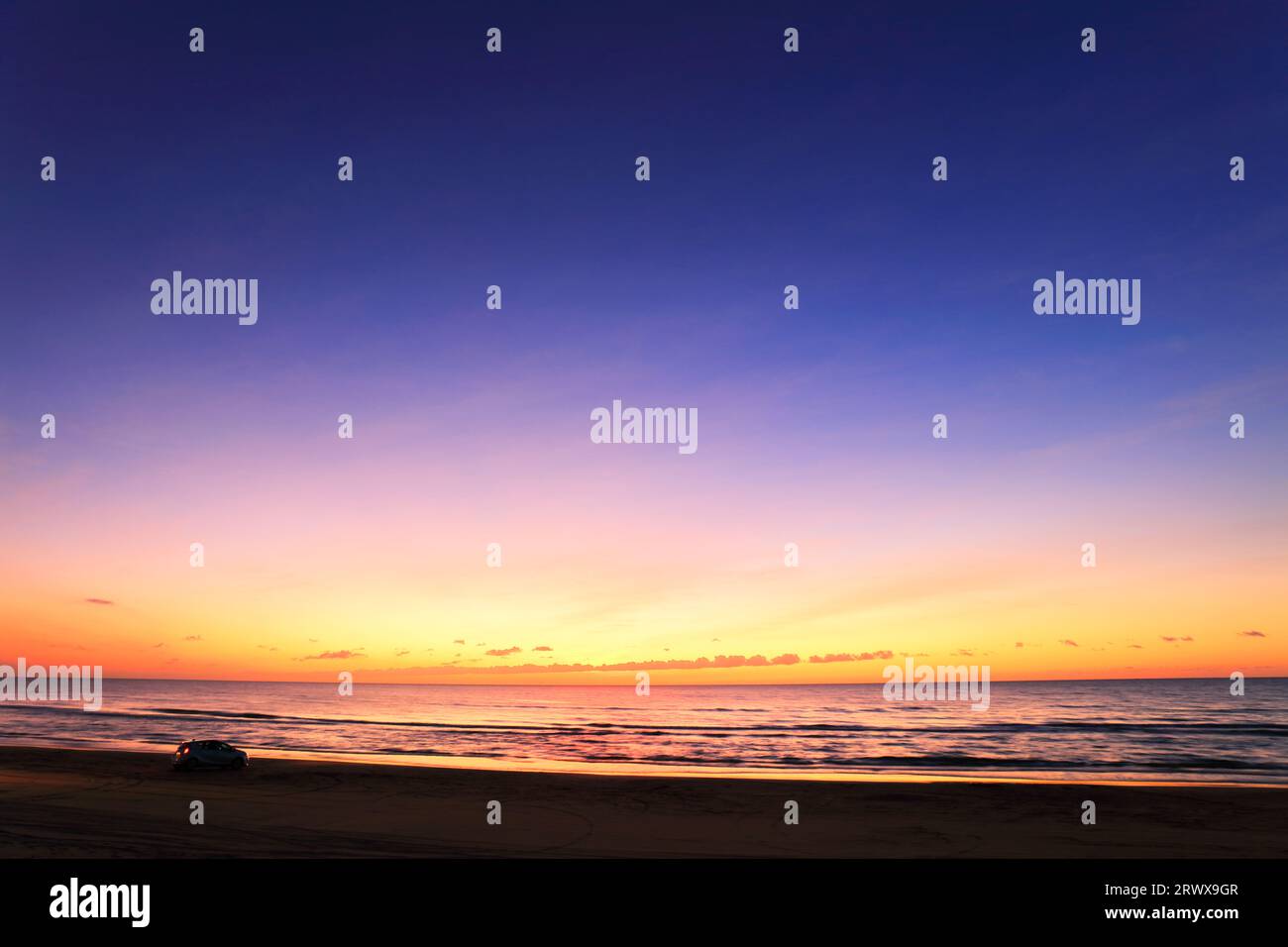 Sunset sky over the car and the Japan Sea at Senrihama Nagisa Driveway ...