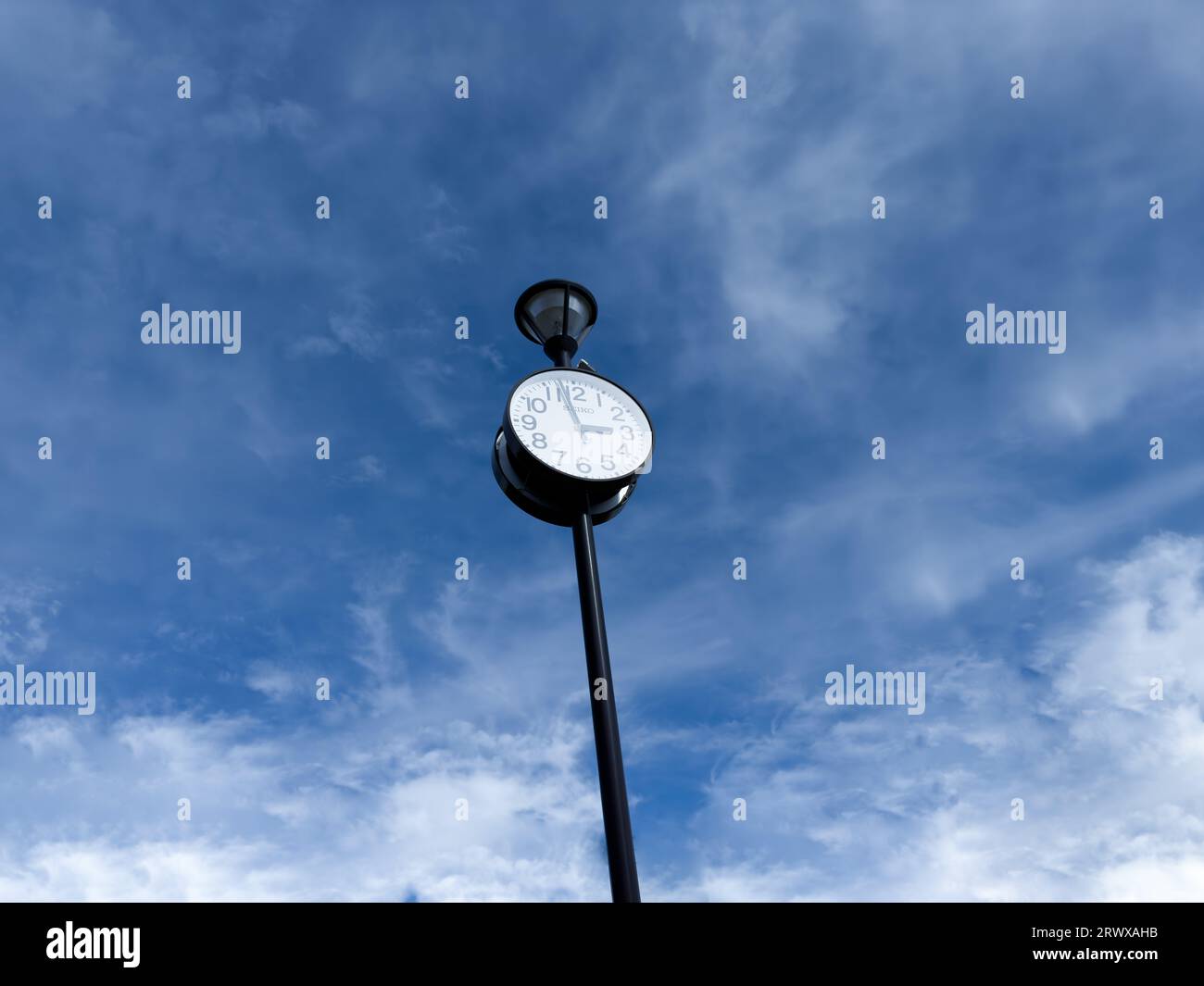City Park Clock Sky With Clouds Stock Photo - Alamy