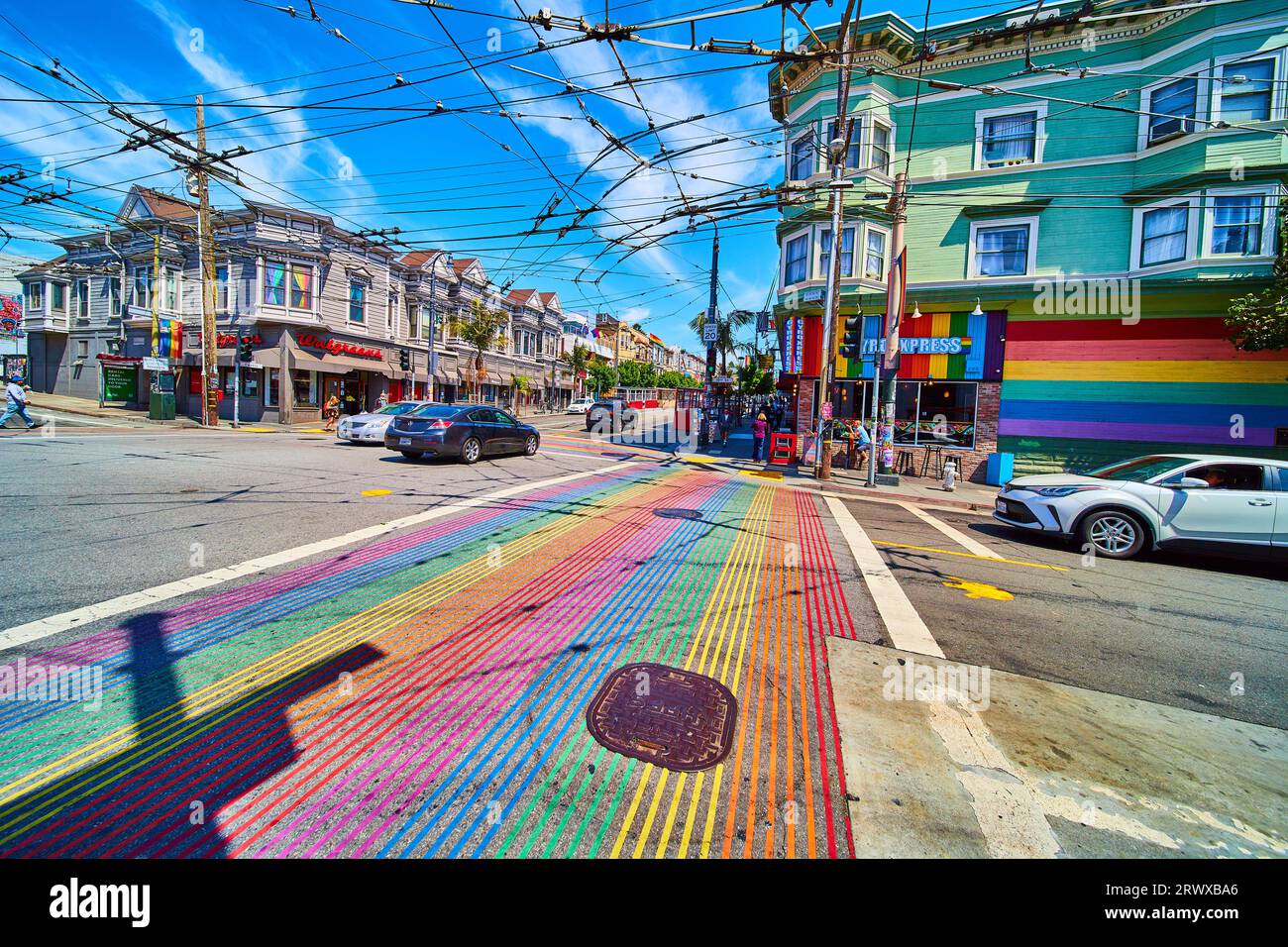Bright and vibrant rainbow crosswalks in Castro District with ... Bright and vibrant rainbow crosswalks in Castro District with ...