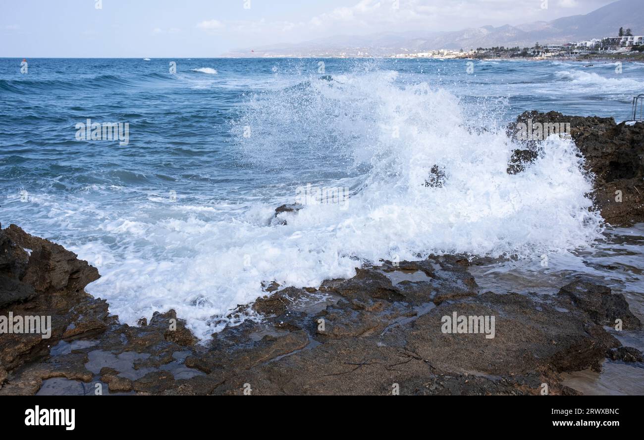 Splashing waves in Stalis area, Stalida, Crete, Greece Stock Photo - Alamy