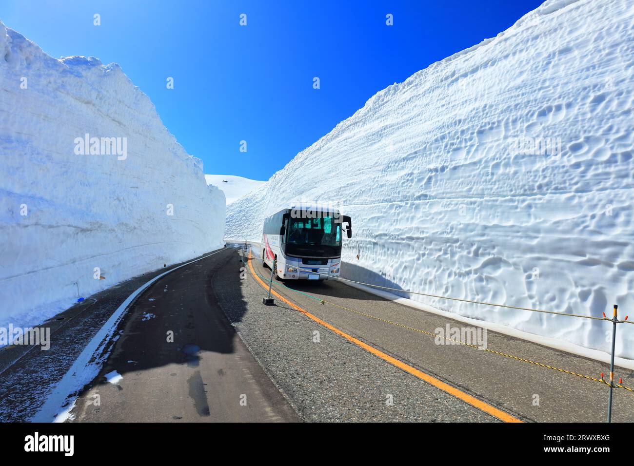 Tateyama in spring with snowy valley, highland bus and clear sky Stock ...