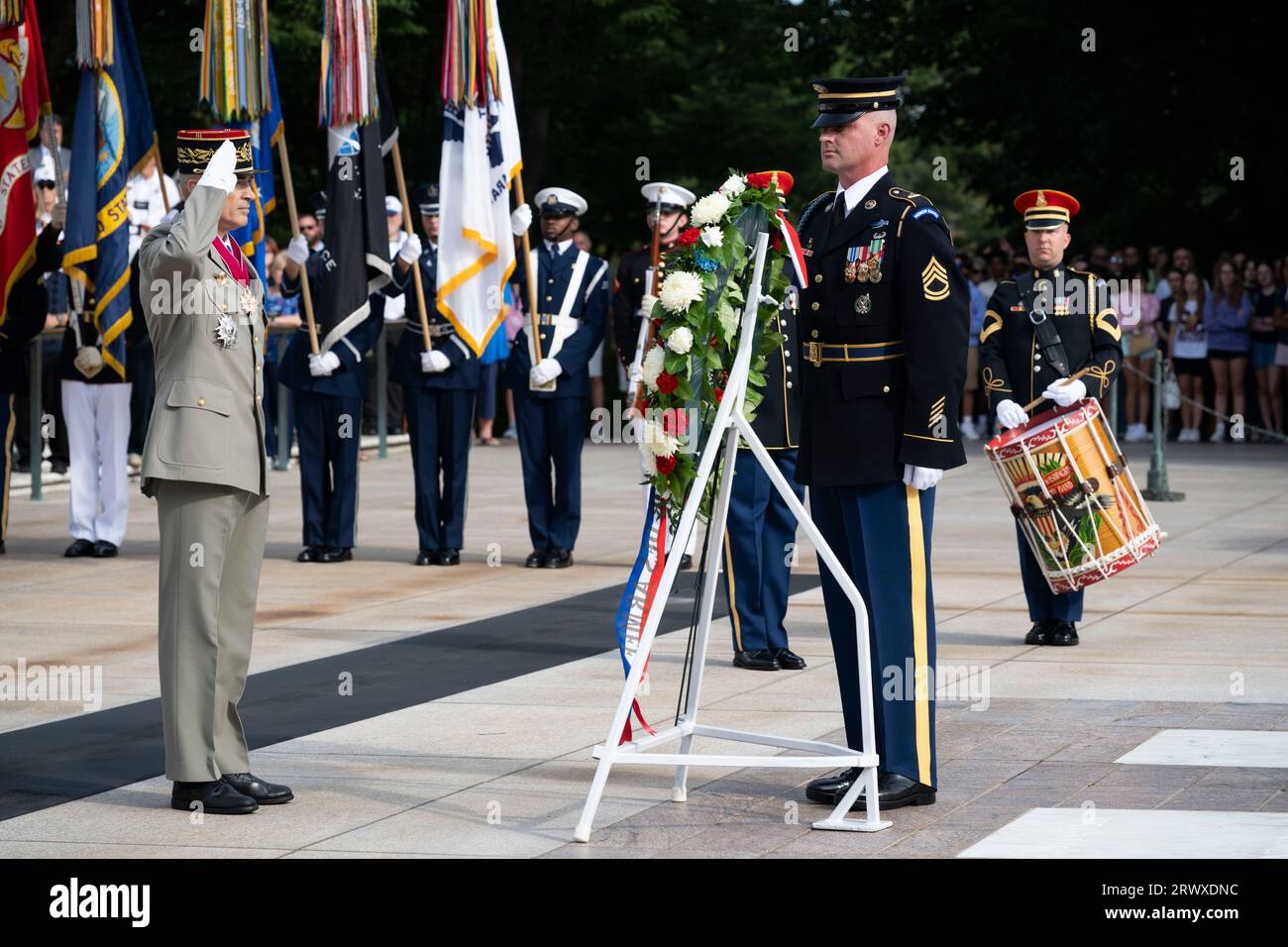 French Chief of the Defense Staff Gen. Thierry Burkhard, left, salutes ...