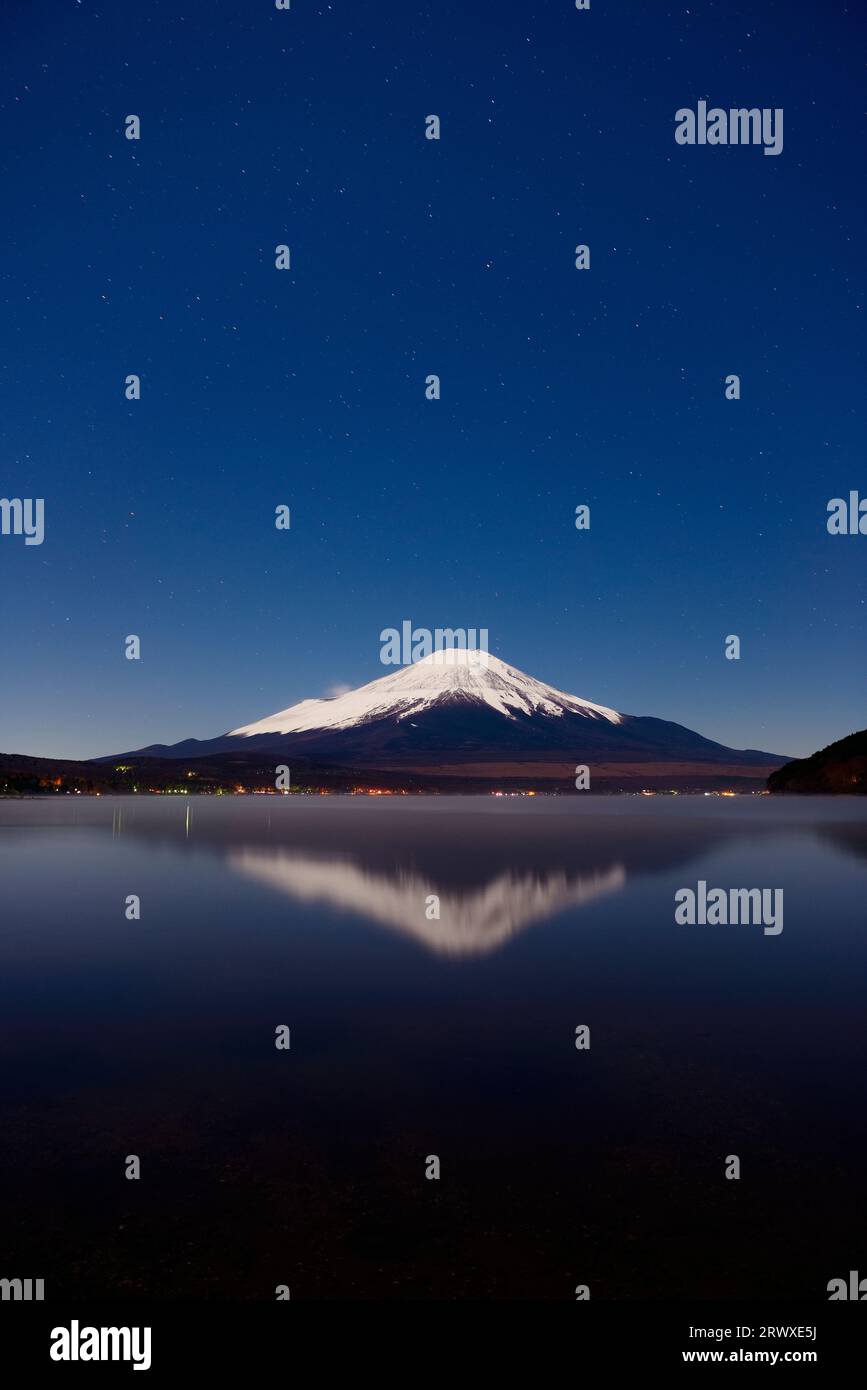Mt. Fuji at night under the moonlight and upside down Mt. Fuji from ...