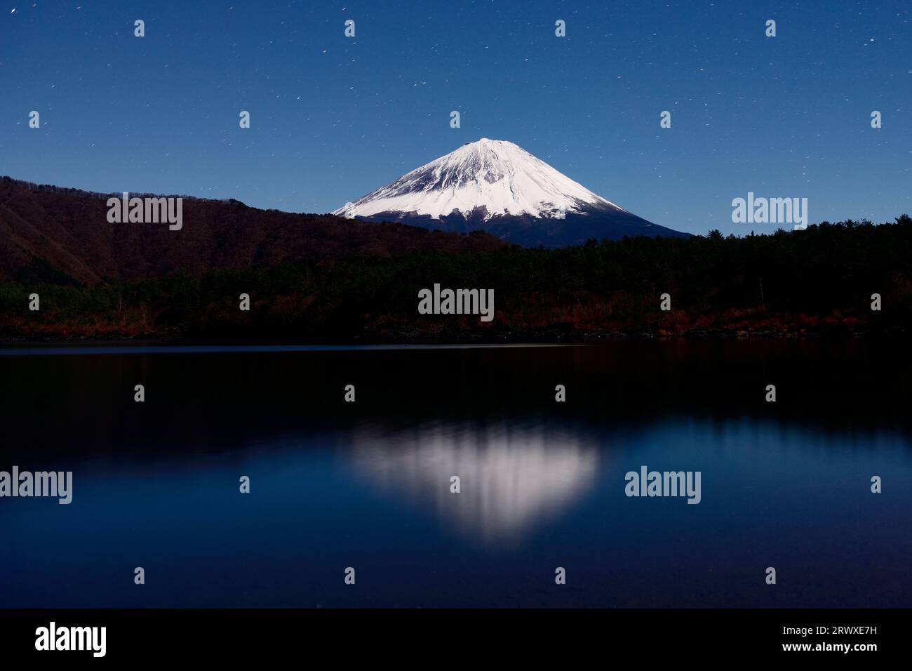 Fuji at night and upside-down Mt. Fuji in the moonlight seen from West ...
