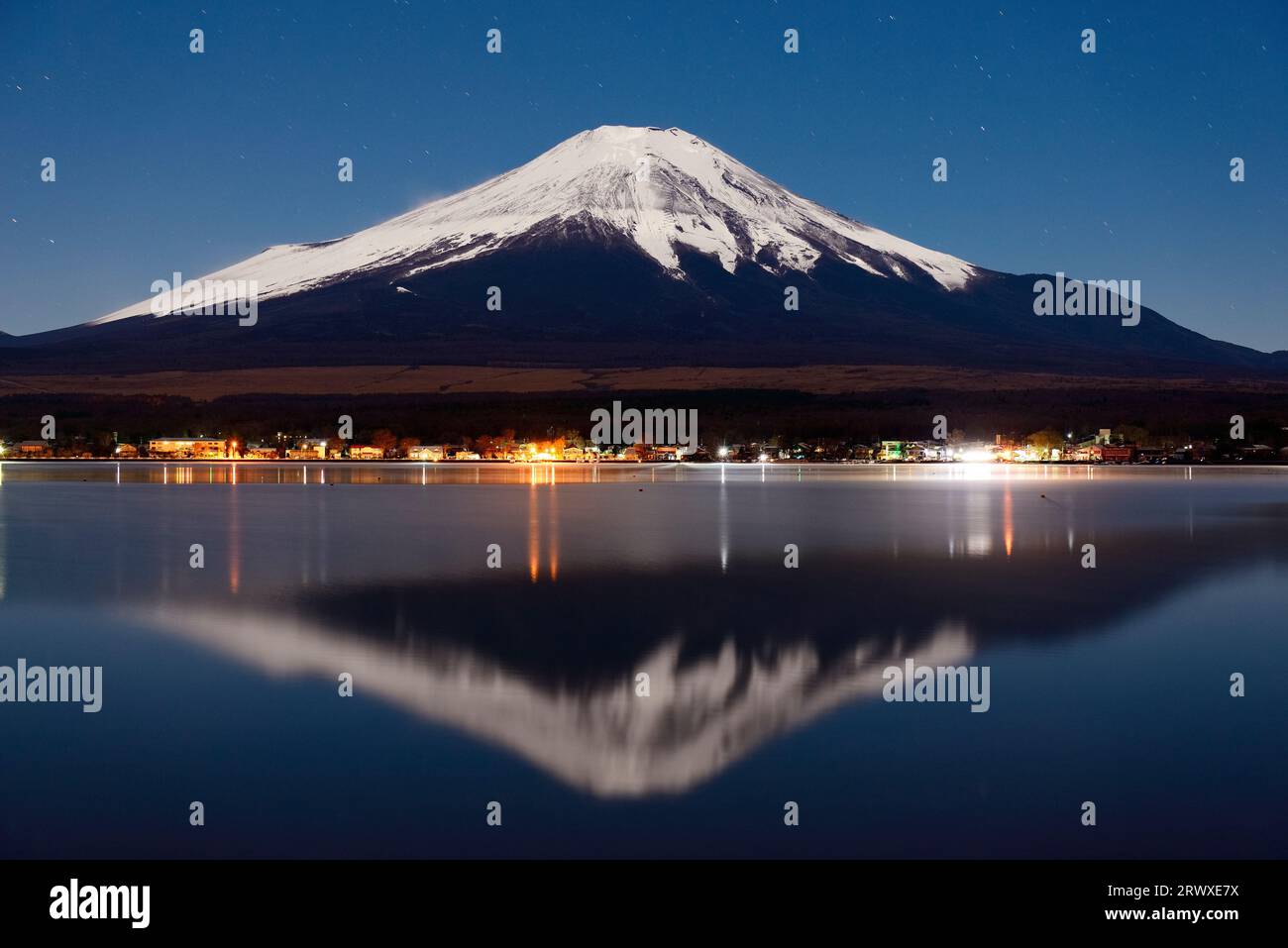 Mt. Fuji at night under the moonlight and upside down Mt. Fuji from ...