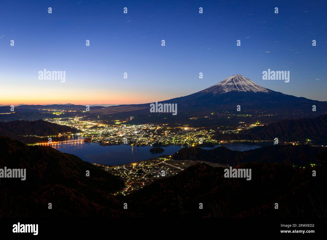 Fuji at dawn and the night view of Lake Kawaguchi from Shindo Pass ...