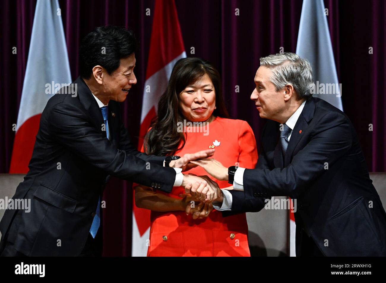 Japan's Minister of Economy, Trade and Industry Nishimura Yasutoshi ...