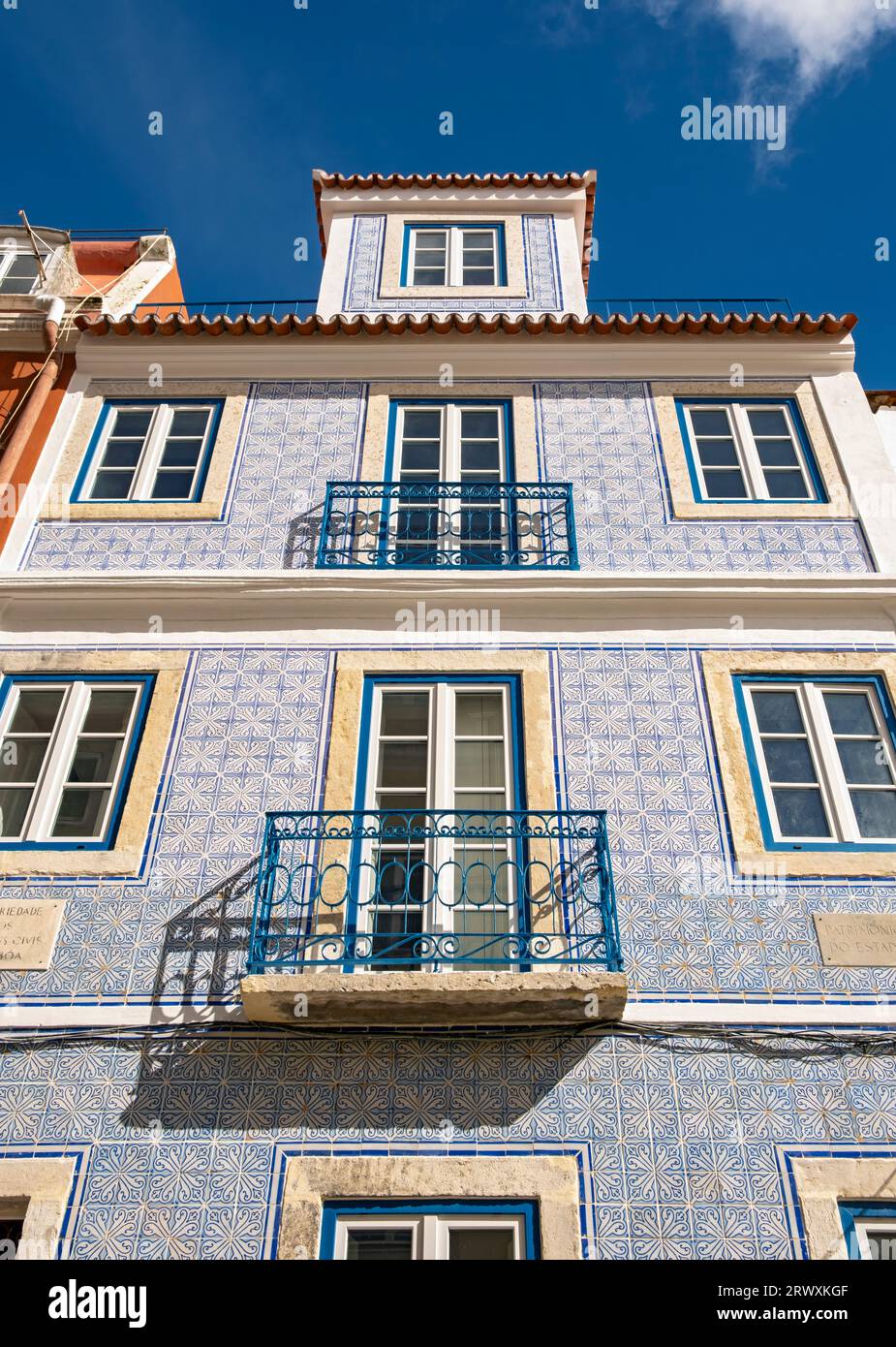 Windows and facade of traditional azulejo wall tiles, Lisbon, Portugal ...