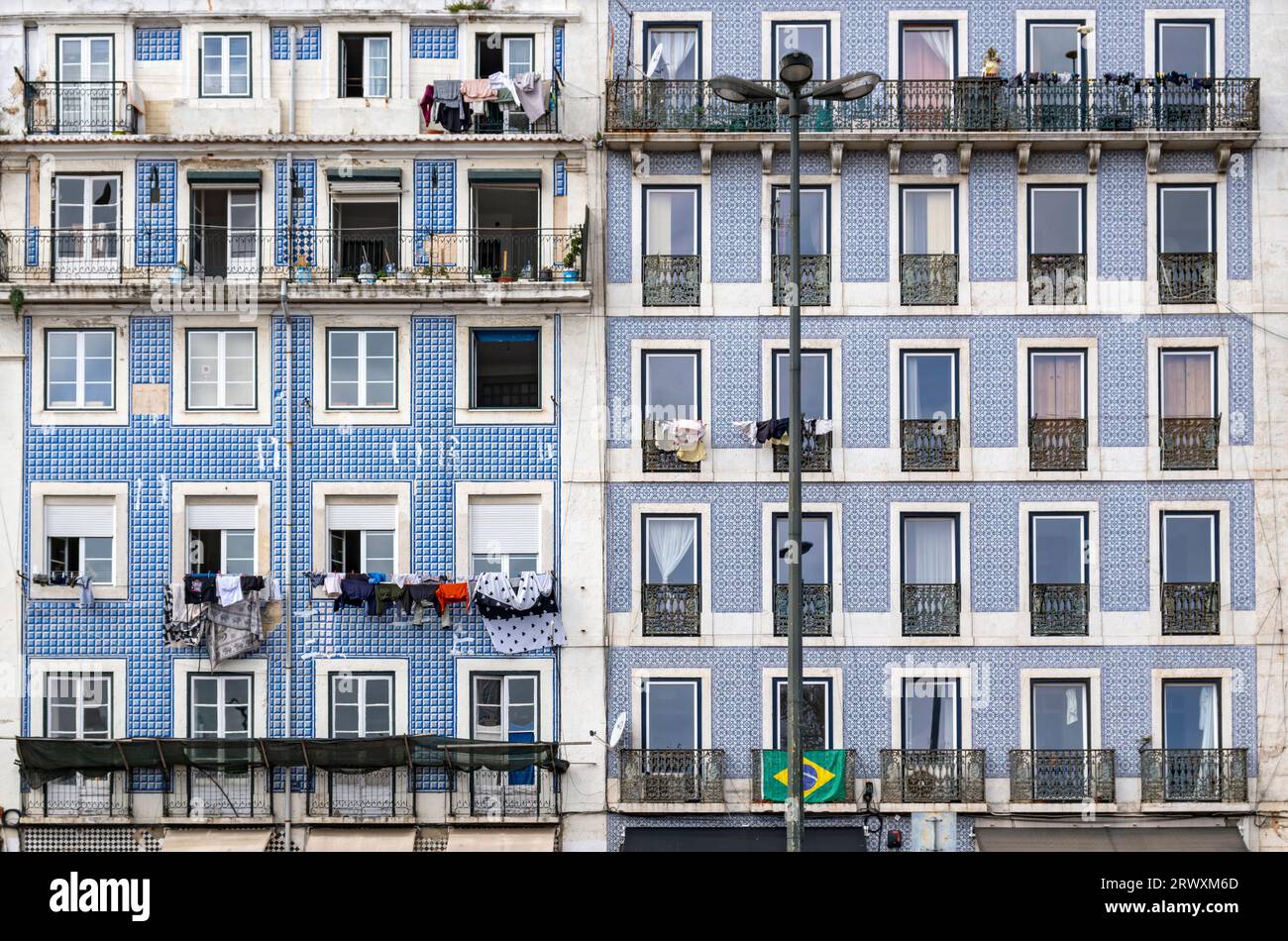 Windows and balconies with facade of traditional azulejo wall tiles ...