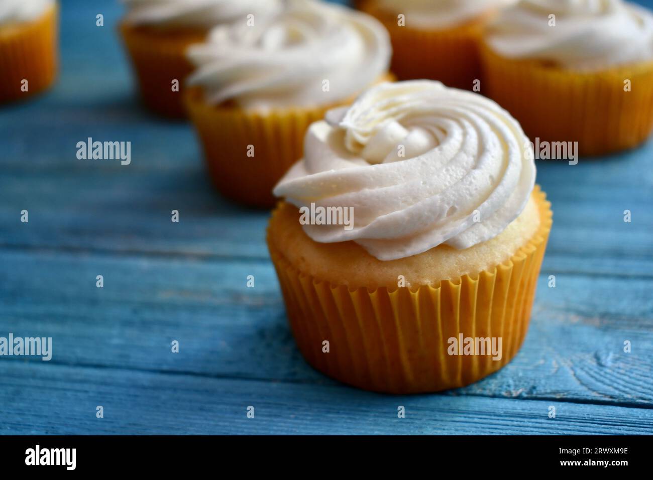 Yellow and blue cupcake hi-res stock photography and images - Alamy