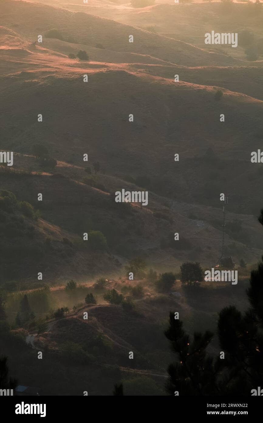 Sunrise over hills valley hi-res stock photography and images - Alamy