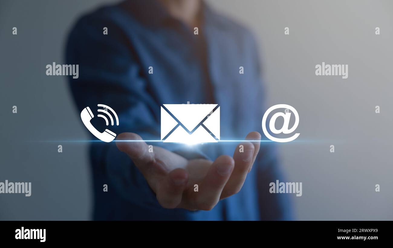 Businessman touching icon mobile phone, mail, telephone and address ...