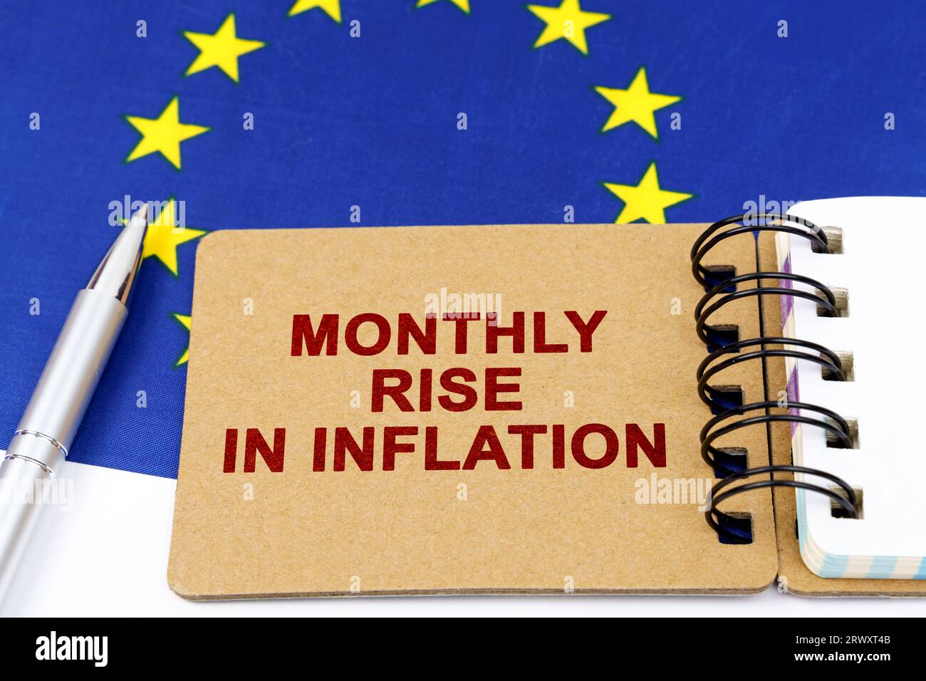 Economy and finance concept. On the flag of the European Union lies a ...