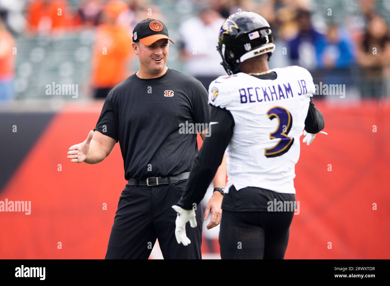 Cincinnati Bengals head coach Zac Taylor talks to Baltimore Ravens wide ...