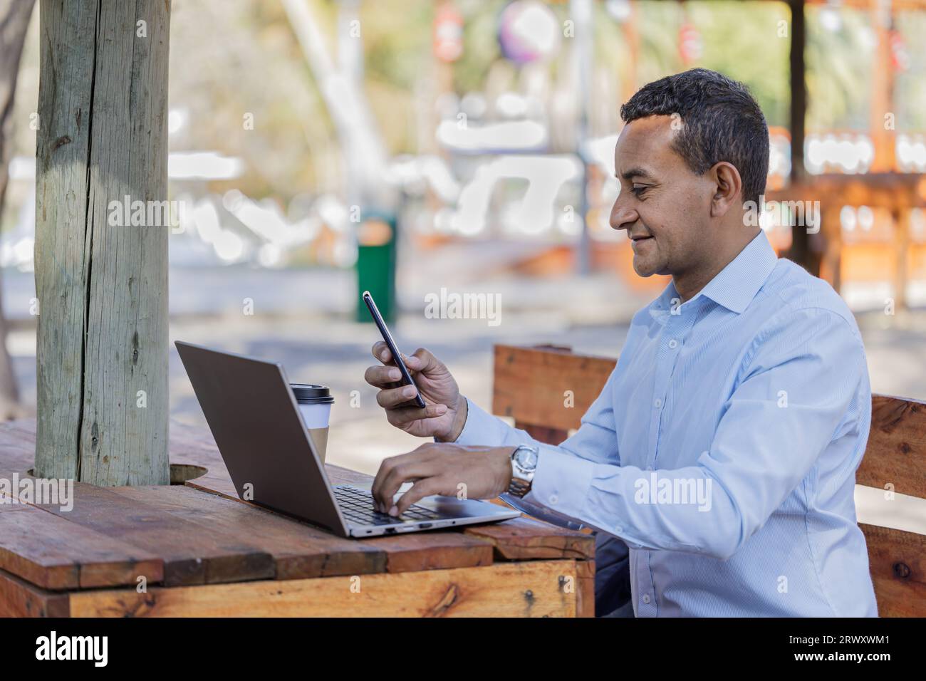Young man sitting laptop computer hi-res stock photography and images ...