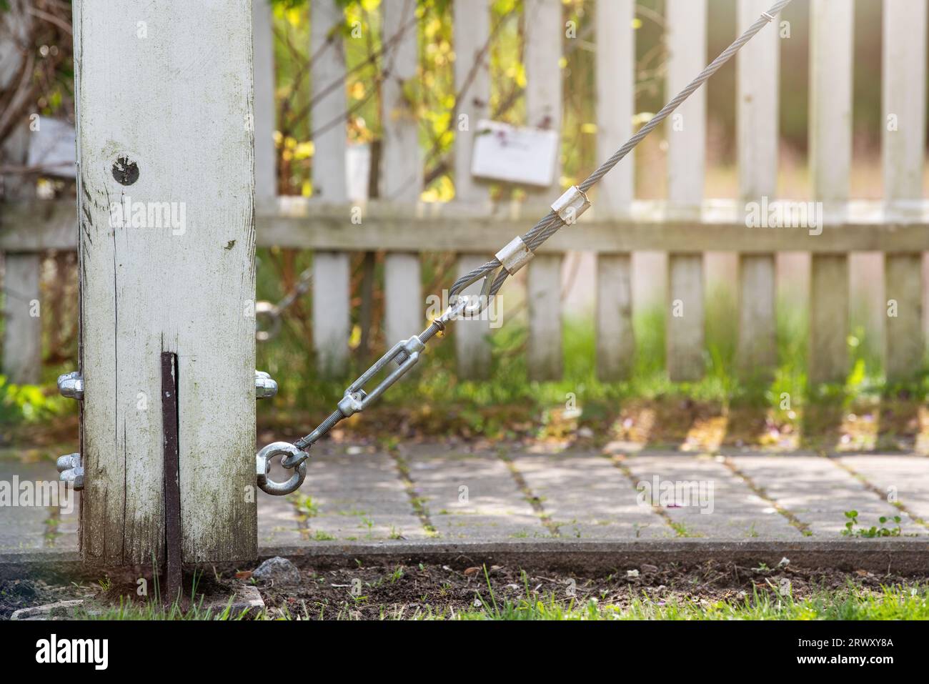 Close-up of a cable tensioner in a park. Fun concept with zip line. To ...