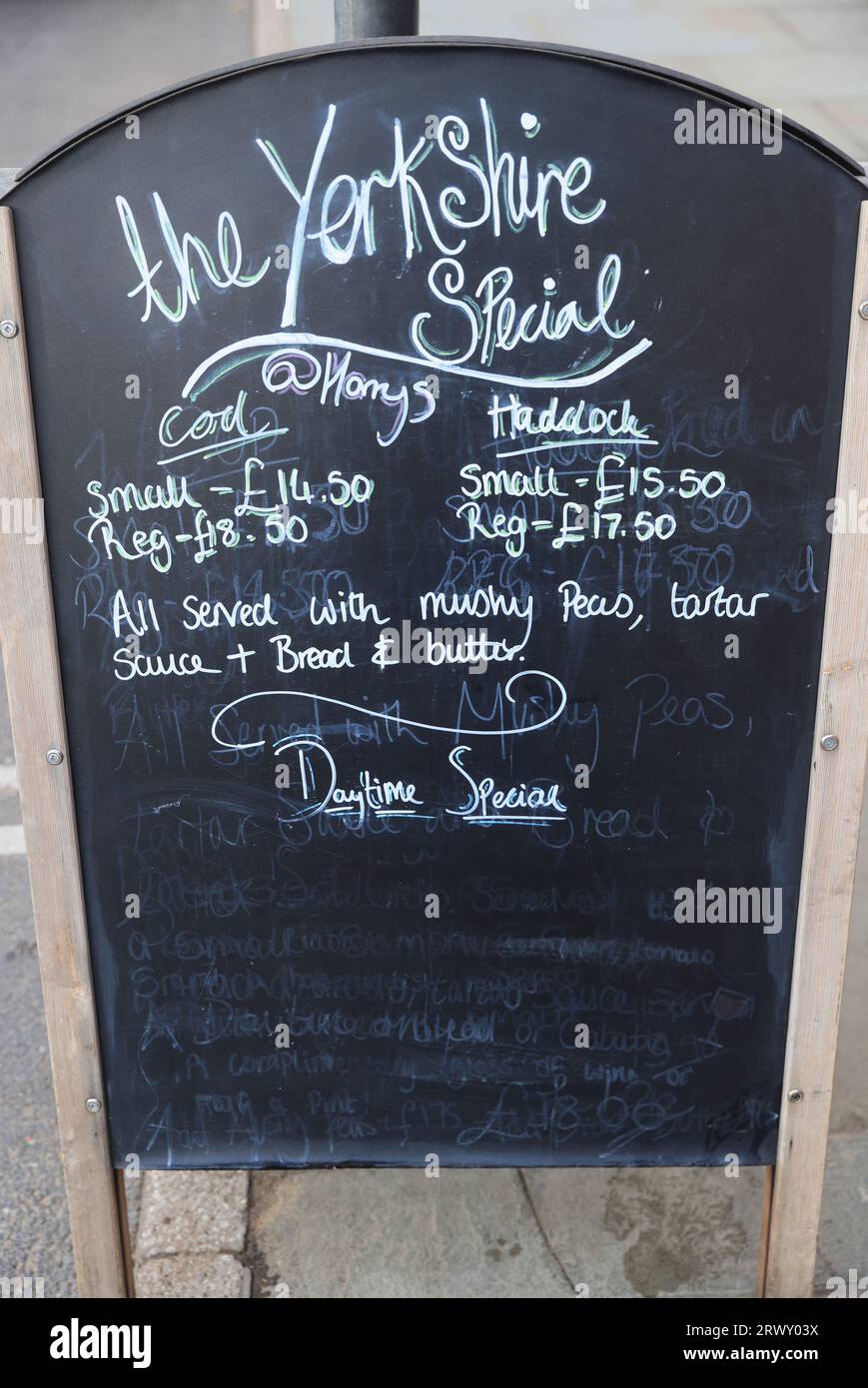 Blackboard menu for the fish and chip restaurant on Whitby harbour, in ...
