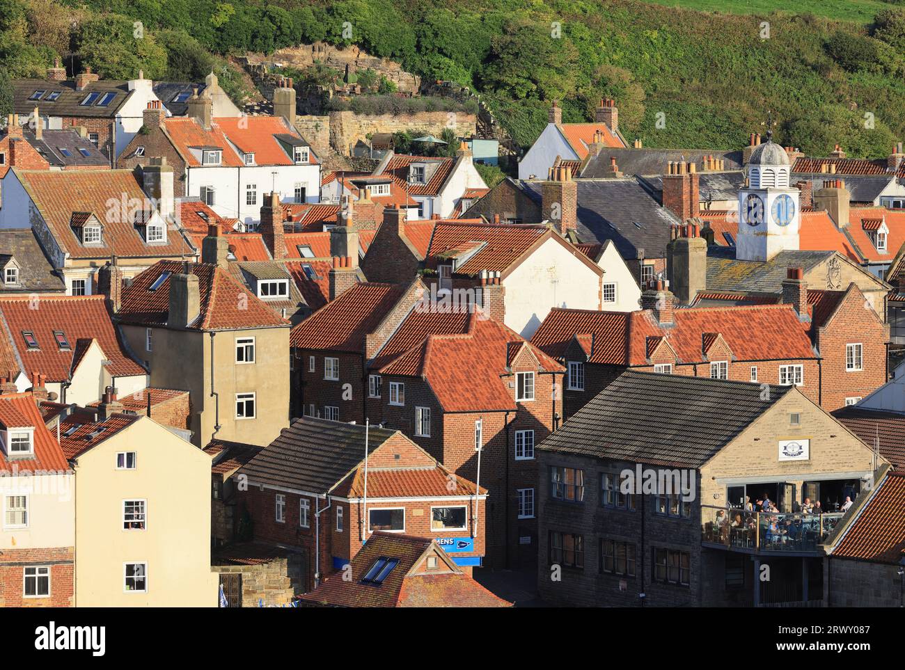 View over the rooves of the pretty old town of Whitby in North ...