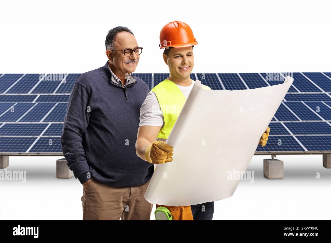 Construction worker showing a solar farm plan to a mature man isolated ...