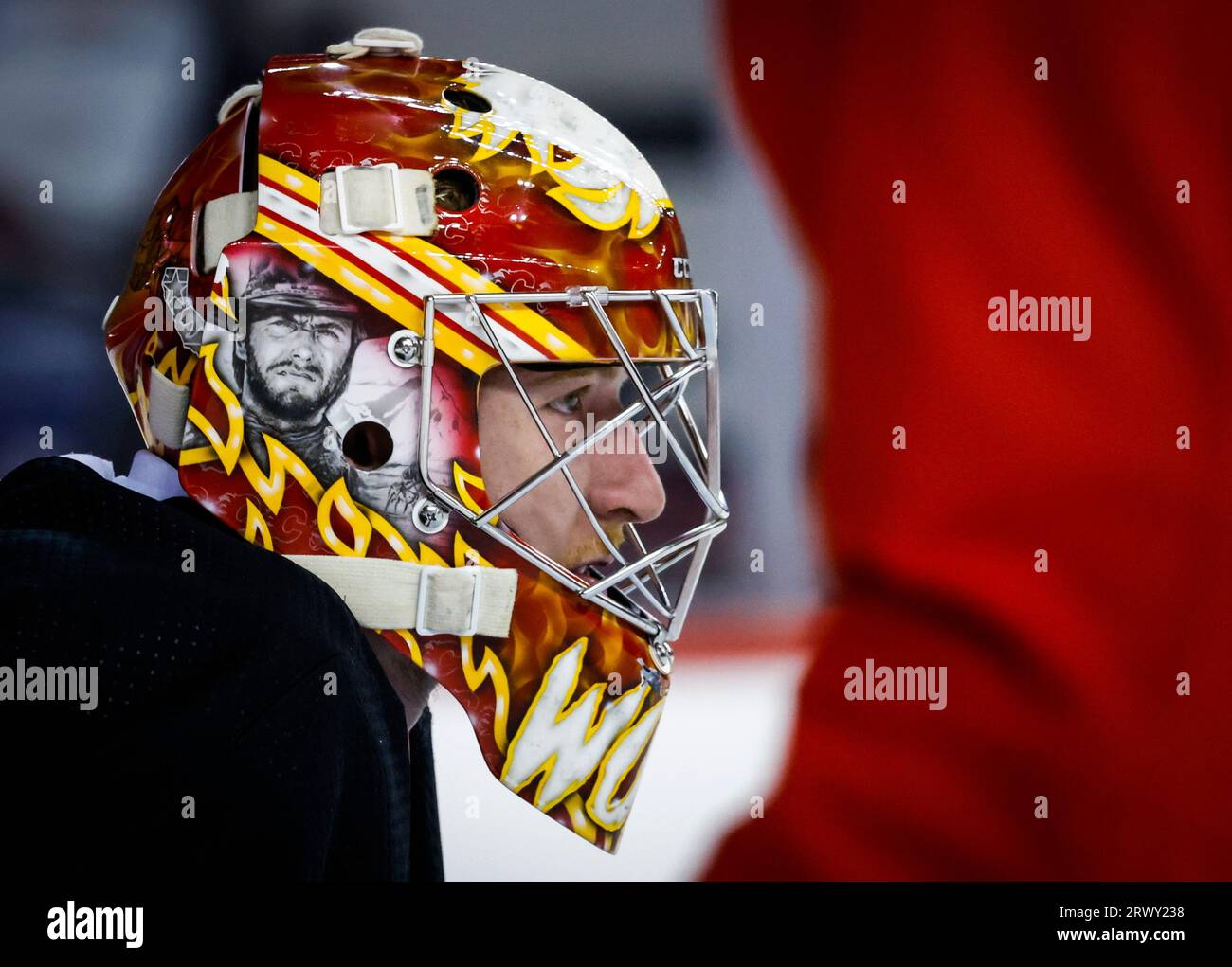 Calgary Flames goalie Dustin Wolf watches during NHL hockey training ...