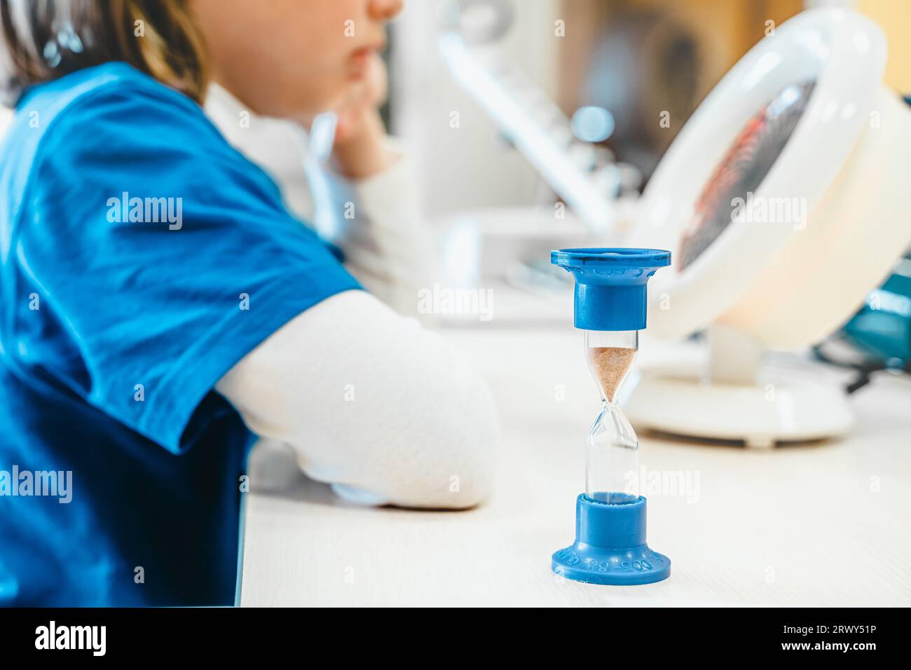 Little girl in medical office undergoing advanced laser vision ...
