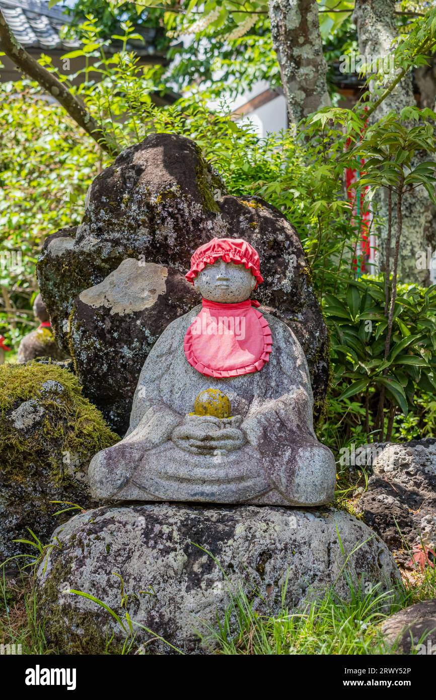 Unique Jizo statues scattered throughout the Izu Shuzenji temple ...