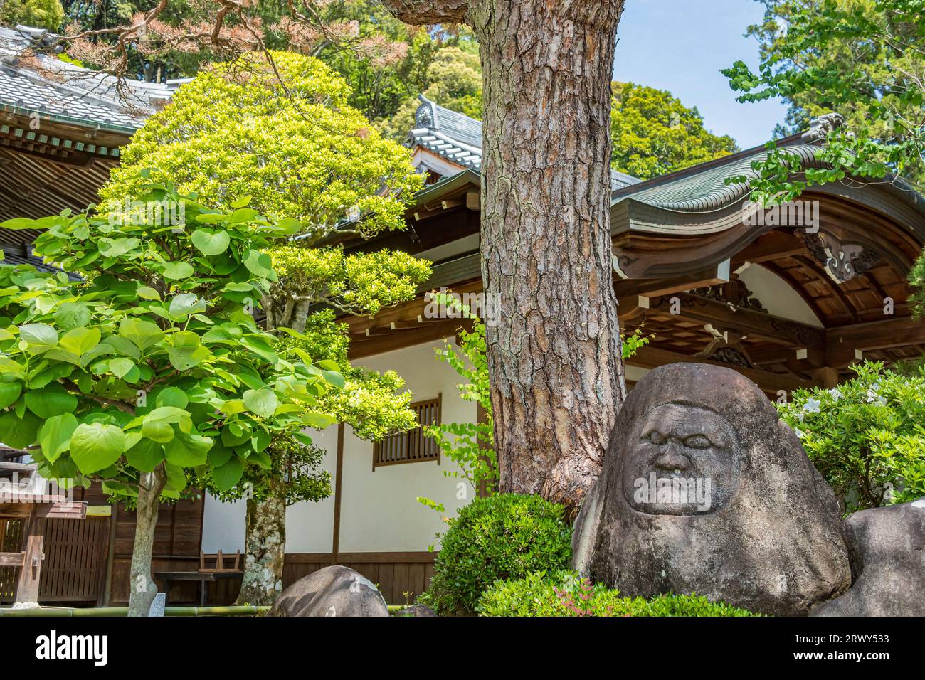 Izu Shuzenji Temple, with a unique Daruma Jizo in front of the main ...