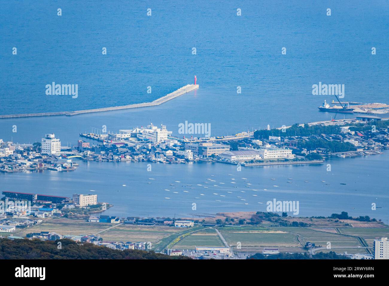 Sado Island Ryotsu Port cityscape seen from Koryu Center Hakuundai ...