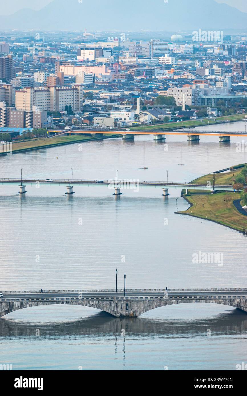 Historic Bandai Bridge and early morning scenery along Niigata Shinano ...