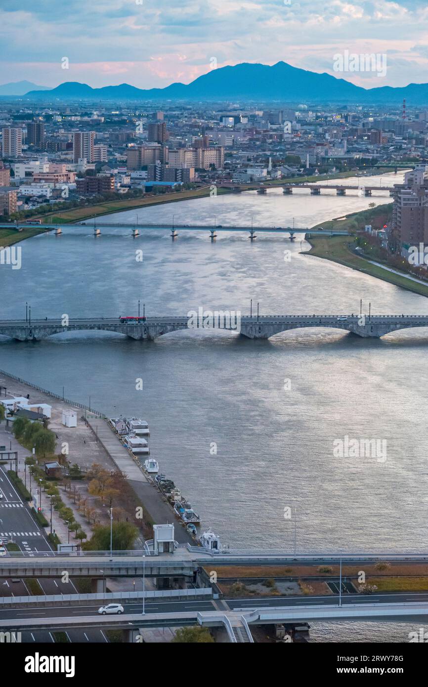 Historic Bandai Bridge and the streetscape along Niigata Shinano River ...