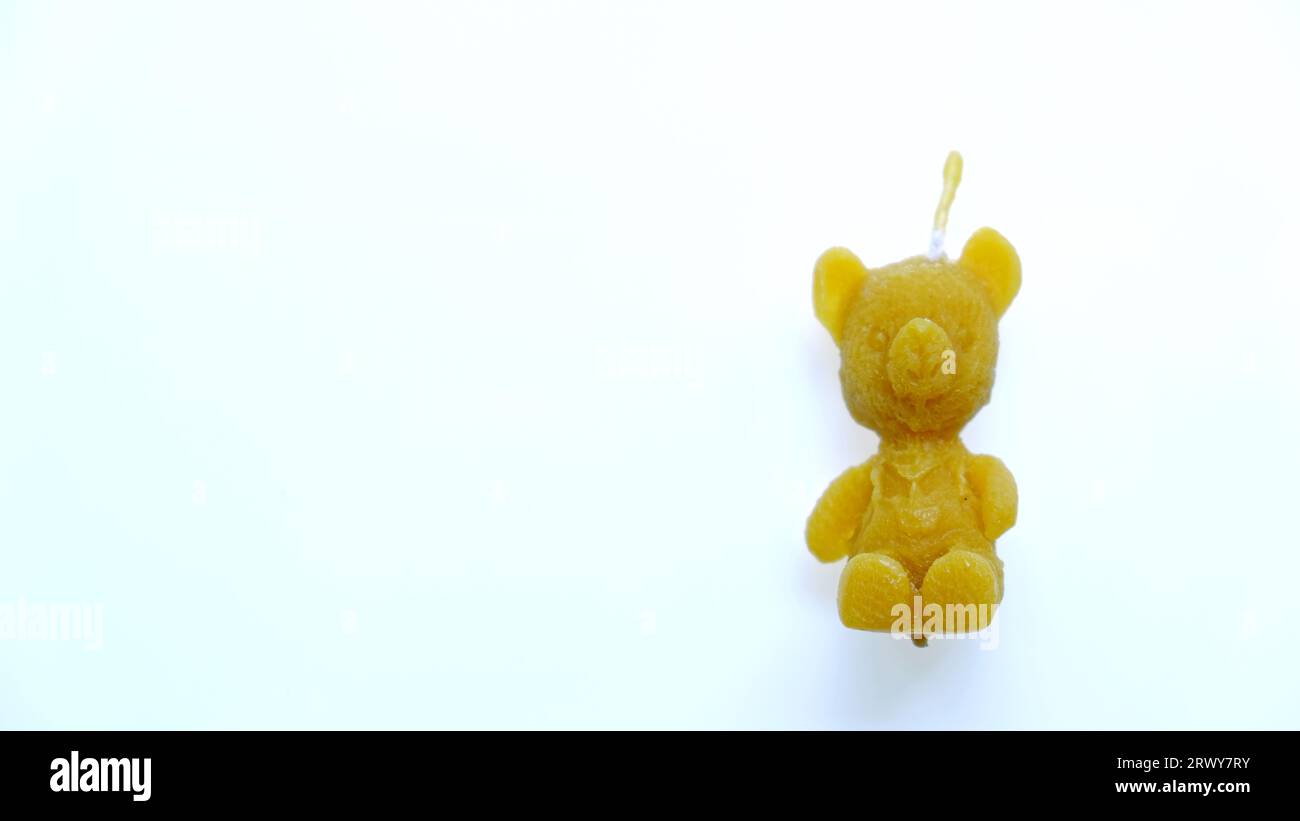 Cute wax bear made of natural beeswax Stock Photo - Alamy