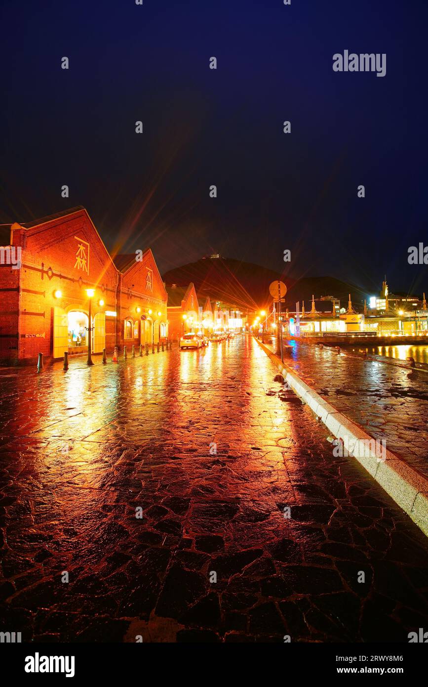 Cobblestone Pavement and Kanamori Warehouse Shining in the Rain - Night ...