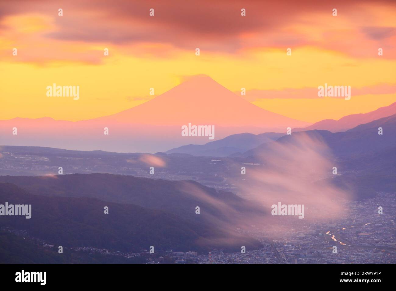 Mount Fuji at Morning Glow and Streaming Clouds Stock Photo - Alamy