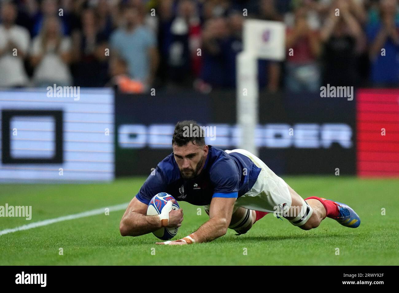 France's Charles Ollivon scores a try during the Rugby World Cup Pool A ...