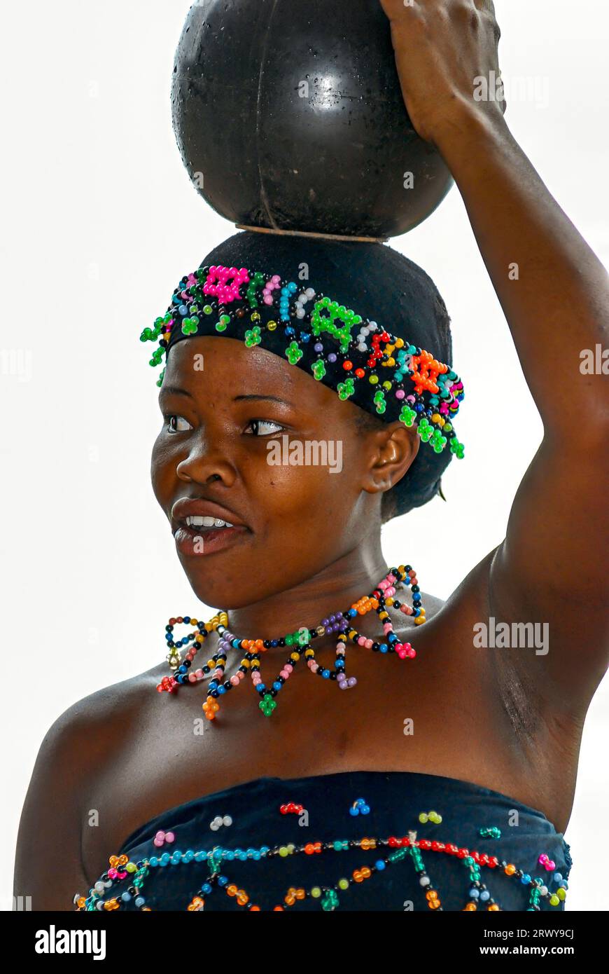 Native female Zulu dancer during in tradional dress performing during ...