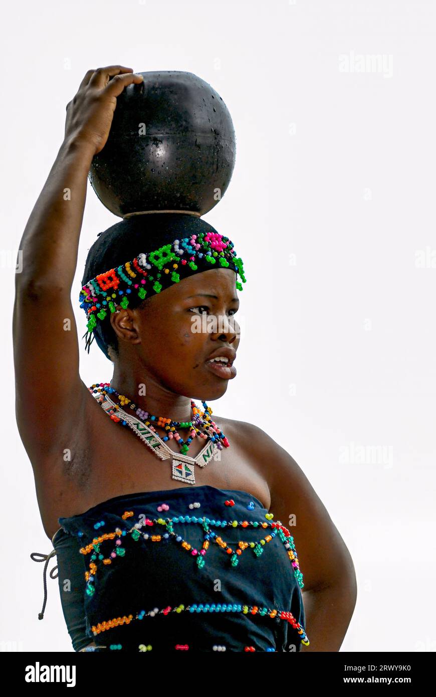 Native female Zulu dancer during in tradional dress performing during ...