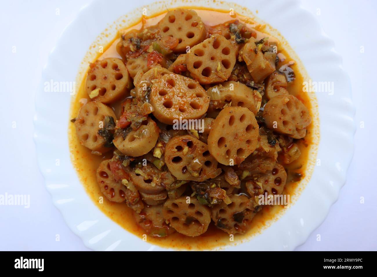 Tasty Lotus stem curry, a side dish made with lotus stem with gravy ...