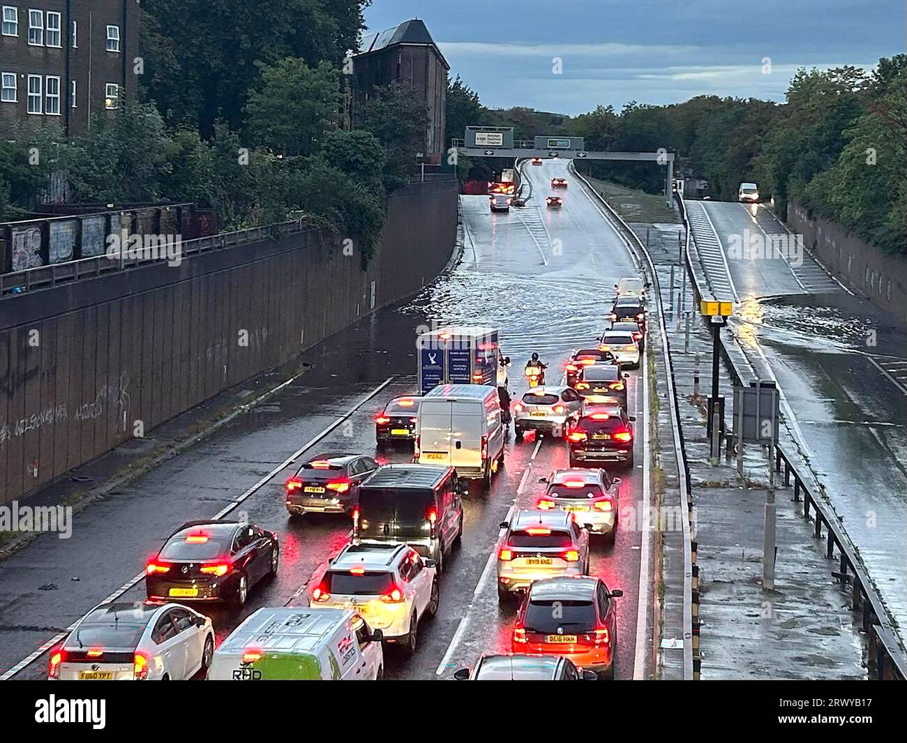 Flooding on the A12 near Hackney Wick station in London. Picture date ...
