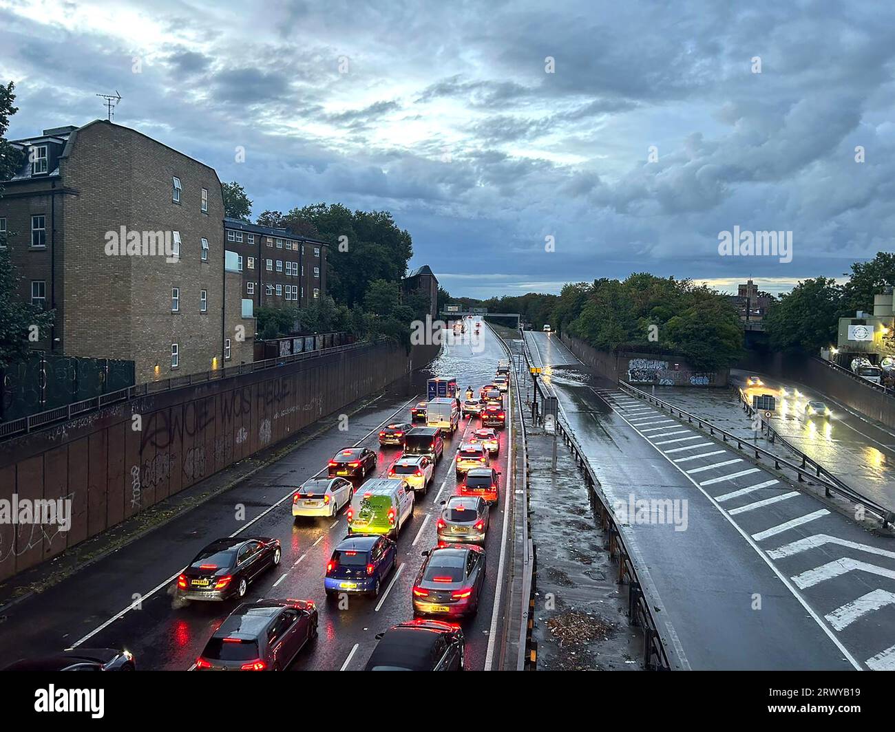 Flooding on the A12 near Hackney Wick station in London. Picture date ...
