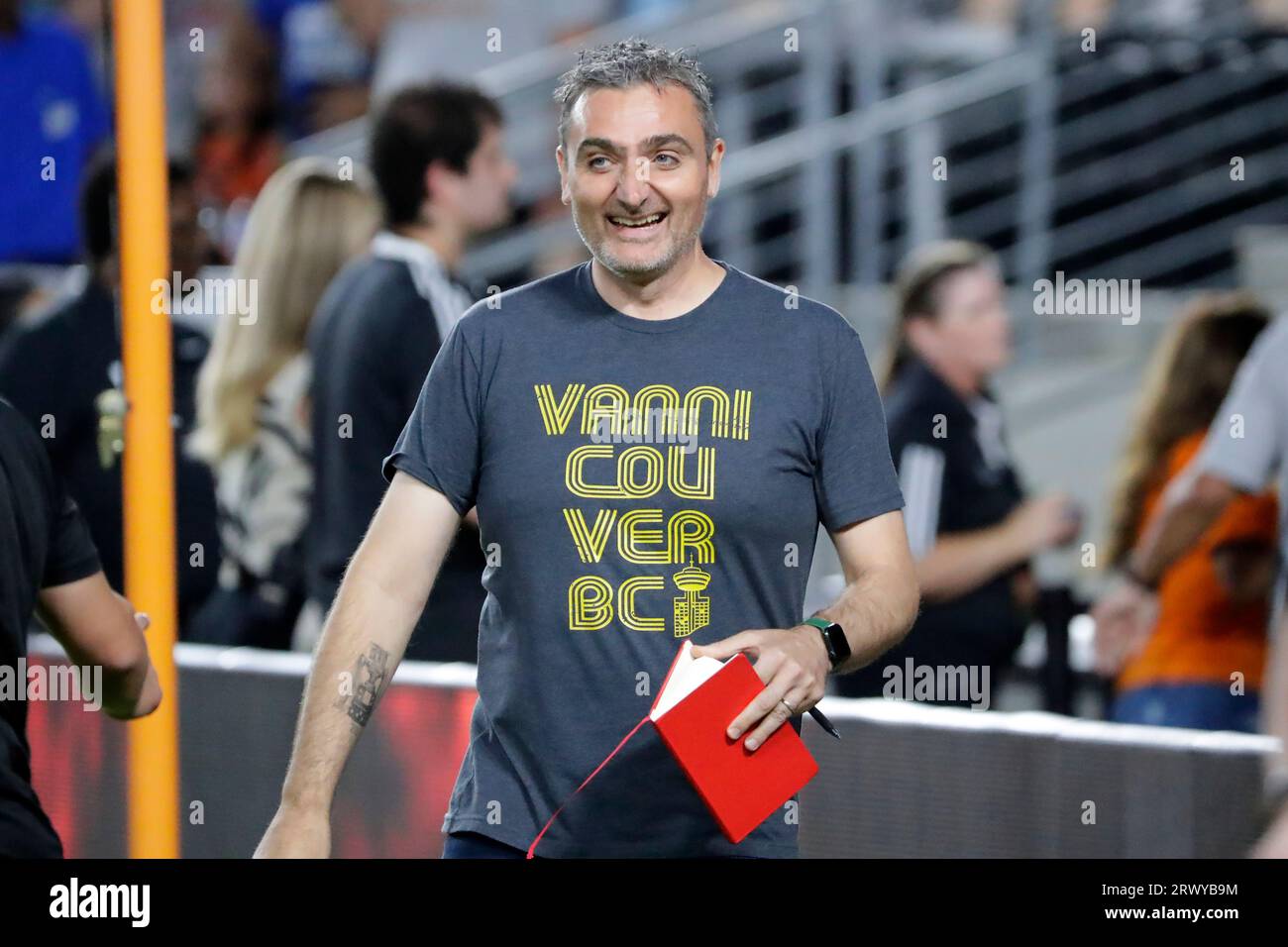 Vancouver Whitecaps head coach Vanni Sartini comes onto the pitch ...