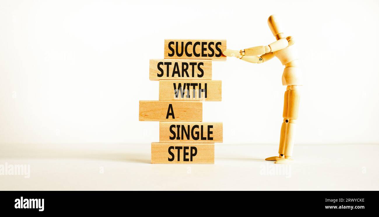 Success symbol. Concept words Success starts with a single step on ...