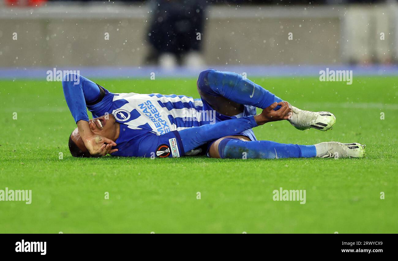 Brighton and Hove Albion's Joao Pedro reacts after he was fouled for a ...